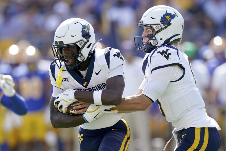 White rushes for 158 yards as West Virginia dominates Oklahoma State ...